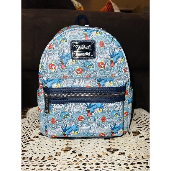Loungefly | Bags | Loungefly Pokmon Magikarp Gyrados Aop Mini Backpack ...